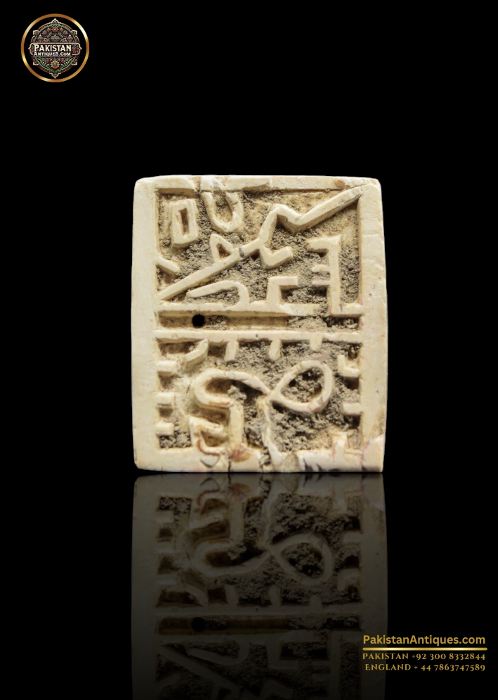 Bone Plaque Amulet likely a handcrafted decorative object inspired by ...